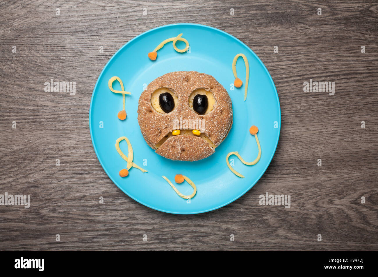 Ghost made of bread on plate and board Stock Photo - Alamy