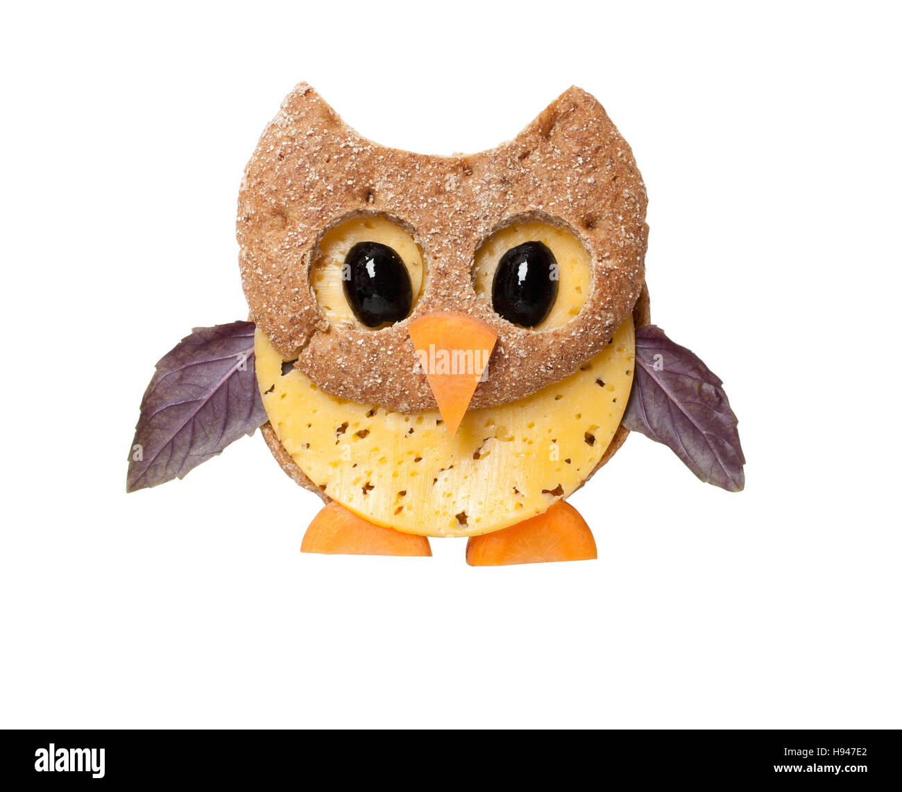 Owl made of bread and cheese on white background Stock Photo - Alamy
