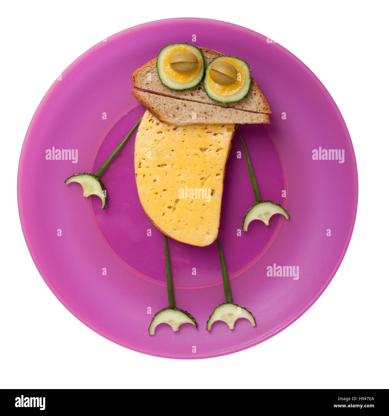 Sleeping frog made of bread and vegetables on plate Stock Photo - Alamy