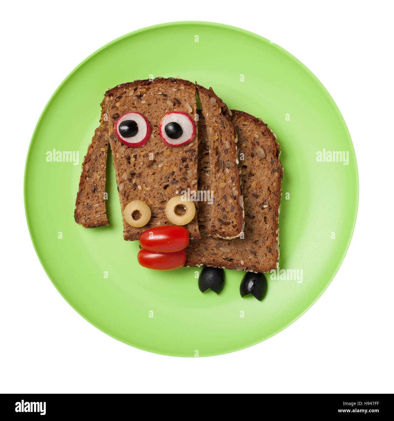 Sheep made of black bread and vegetables on plate Stock Photo - Alamy