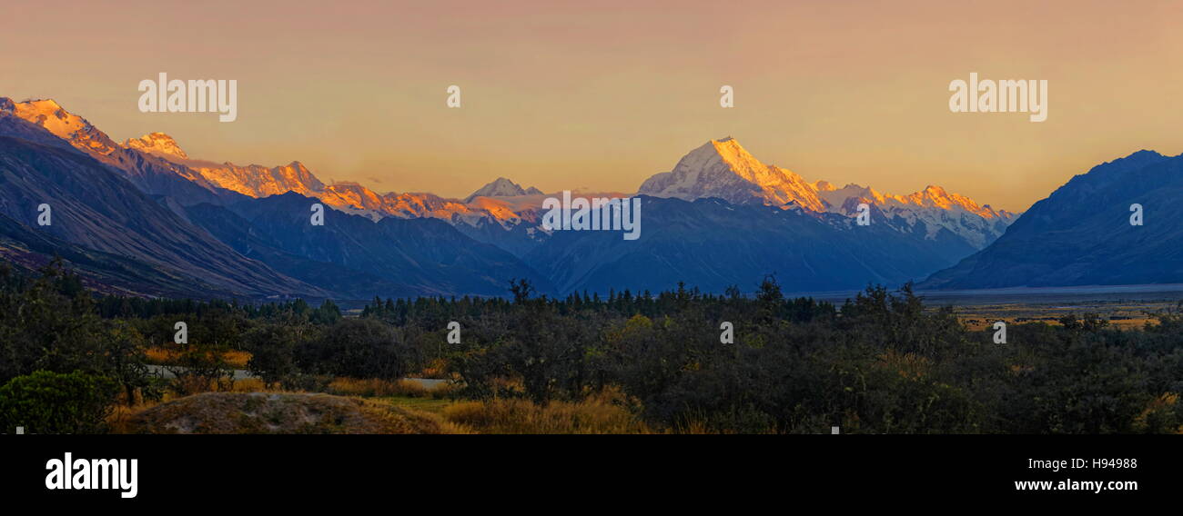 The peak of snowy Mount Cook, Aoraki with bush landscape at sunrise ...