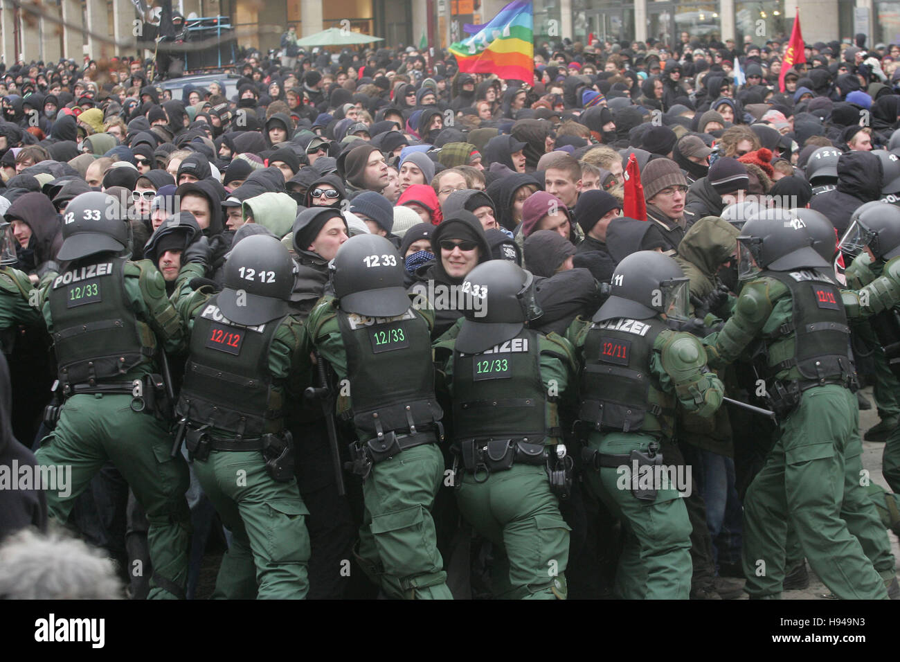 Crowded safety helmet uniform protest hi-res stock photography and ...