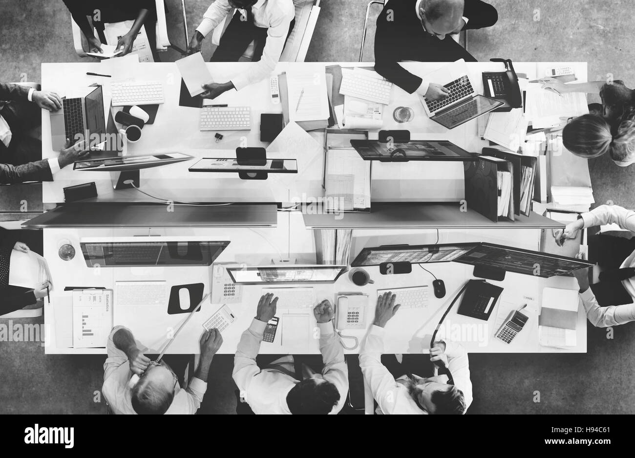 Group businessmen working laptop Black and White Stock Photos & Images ...