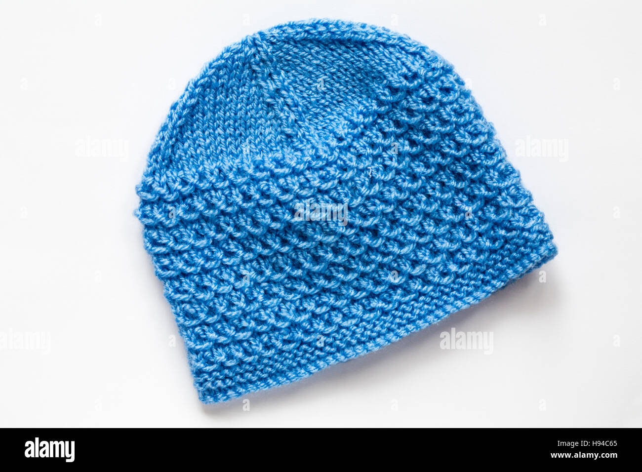 blue knitted hat isolated on white background Stock Photo - Alamy