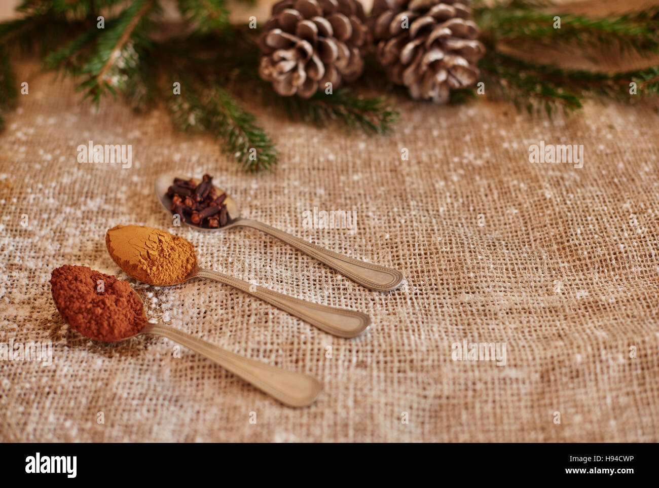Three teaspoons with some spices on it Stock Photo - Alamy