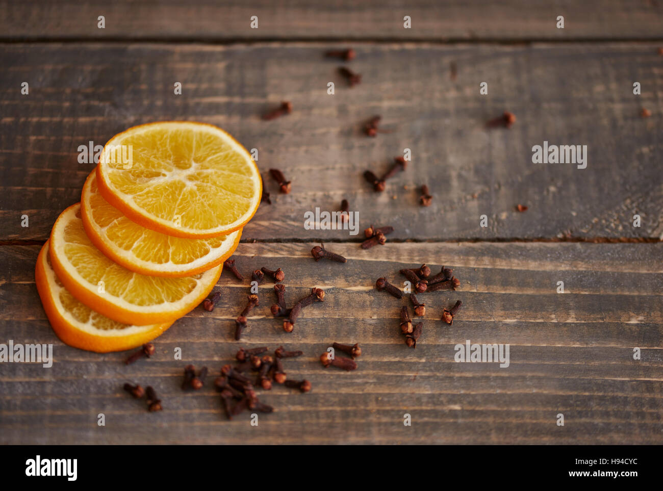 Slice of lemon with cloves hi-res stock photography and images - Alamy