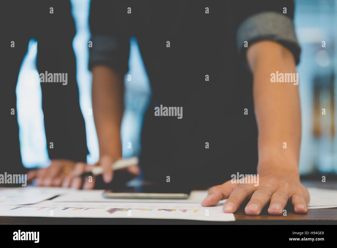 people working with document, tablet - meeting in office workplace ...