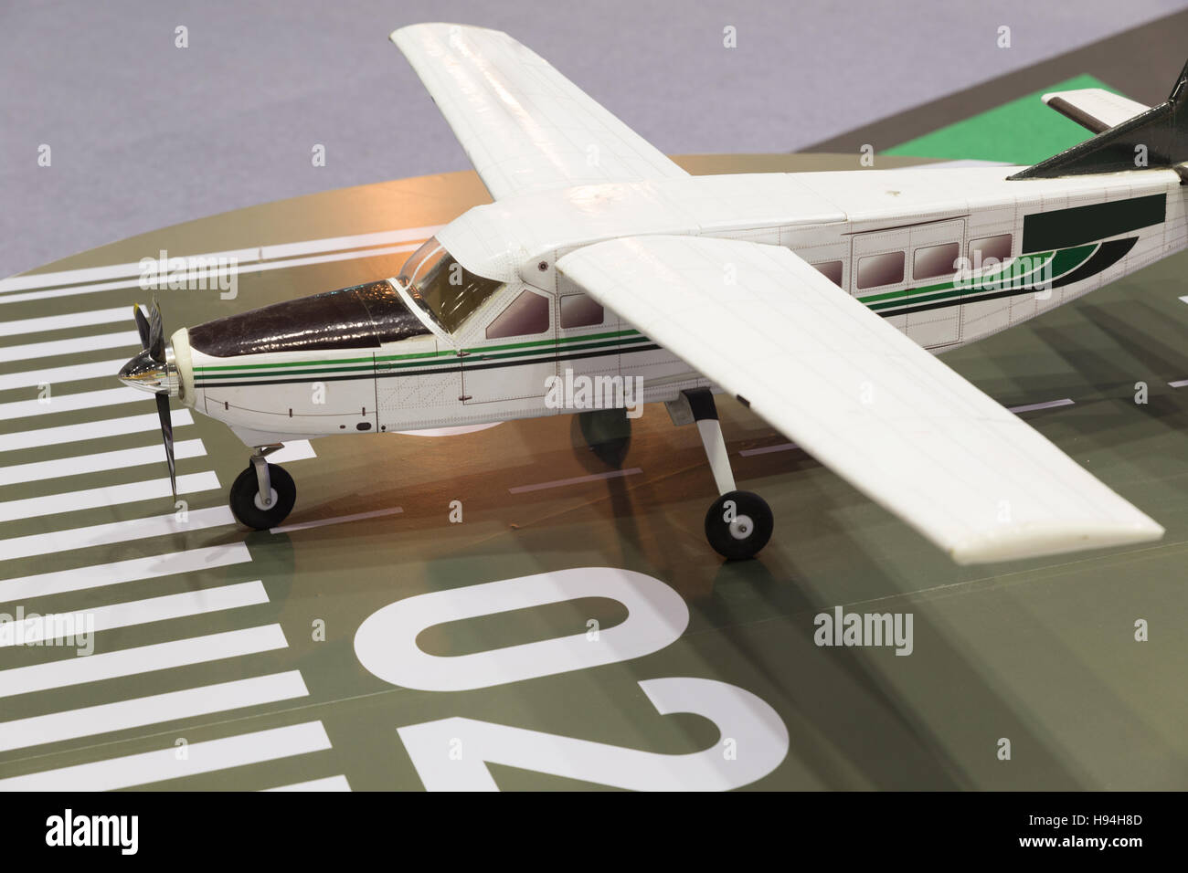 white airplane aircraft aeroplane metal miniature model Stock Photo - Alamy