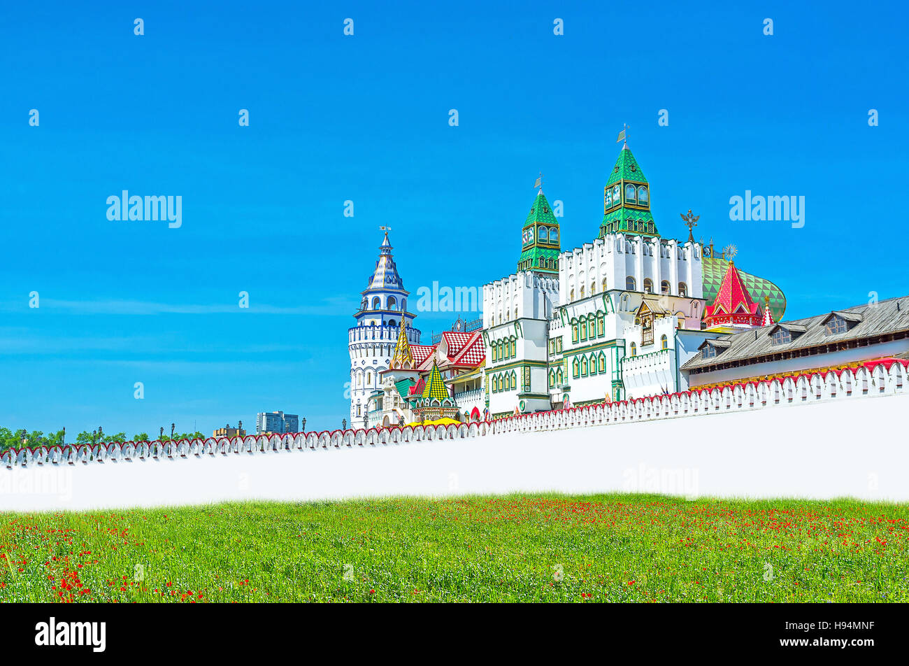 The white bridge and richly decorative central gates lead to ...