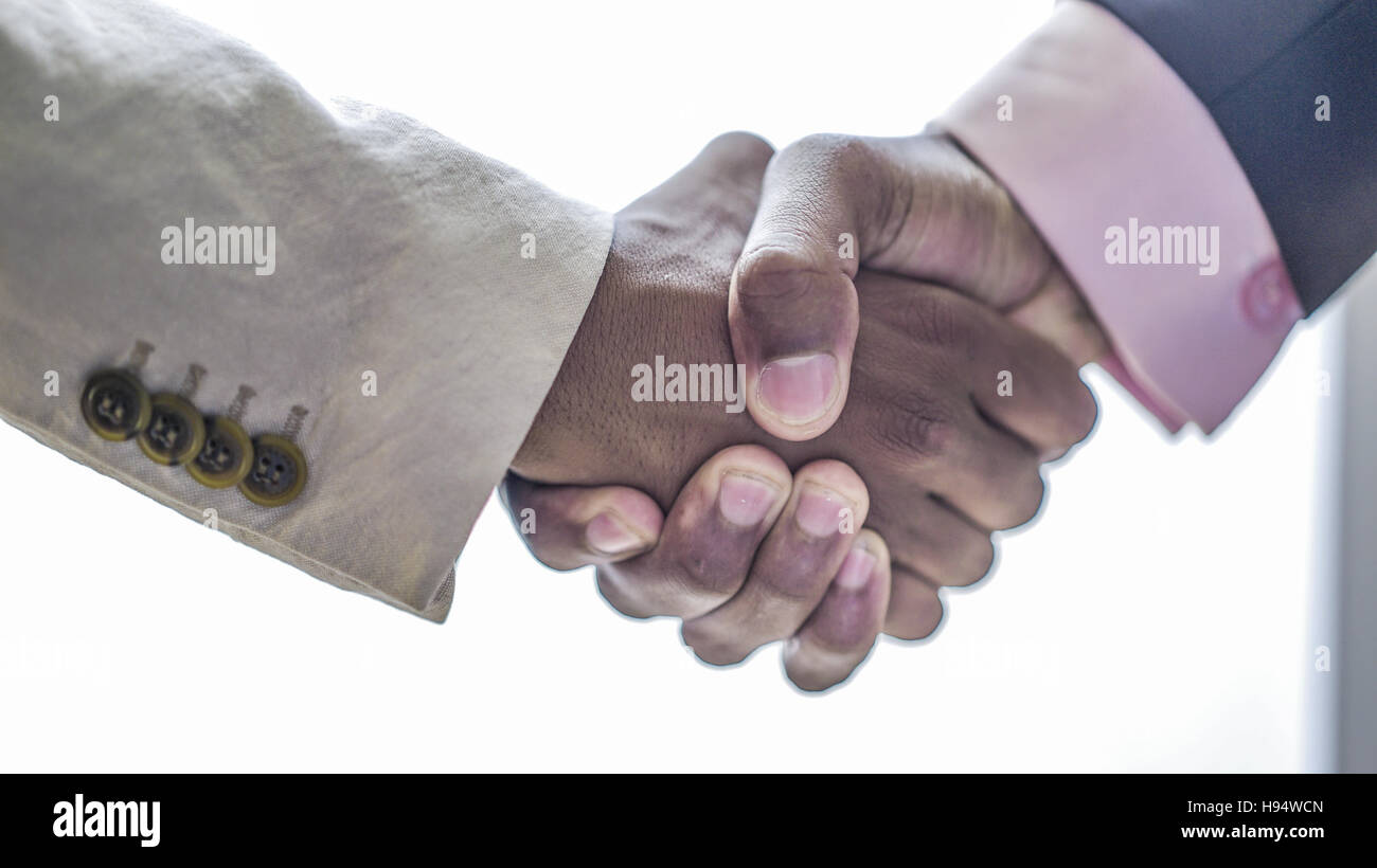 African Hand Shake Stock Photos & African Hand Shake Stock Images - Alamy