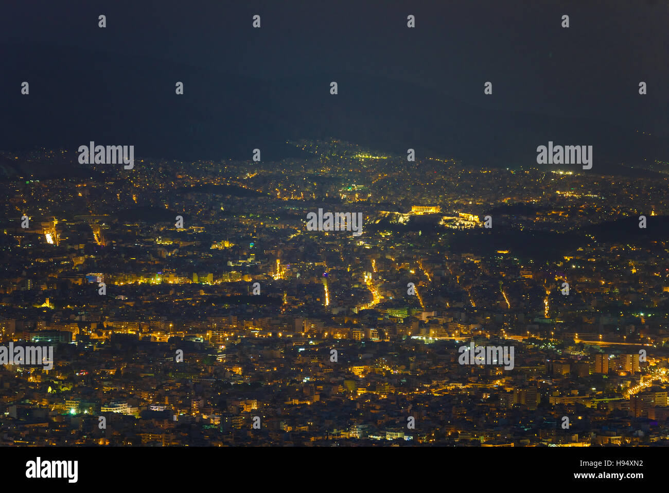 Athens skyline view after sunset with vivid street lights in Greece ...