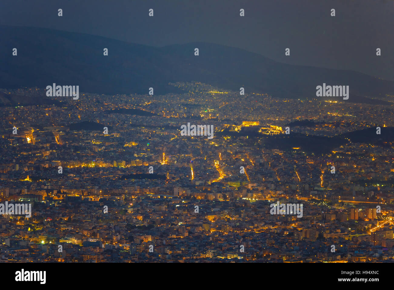 Athens skyline view after sunset with vivid street lights in Greece ...