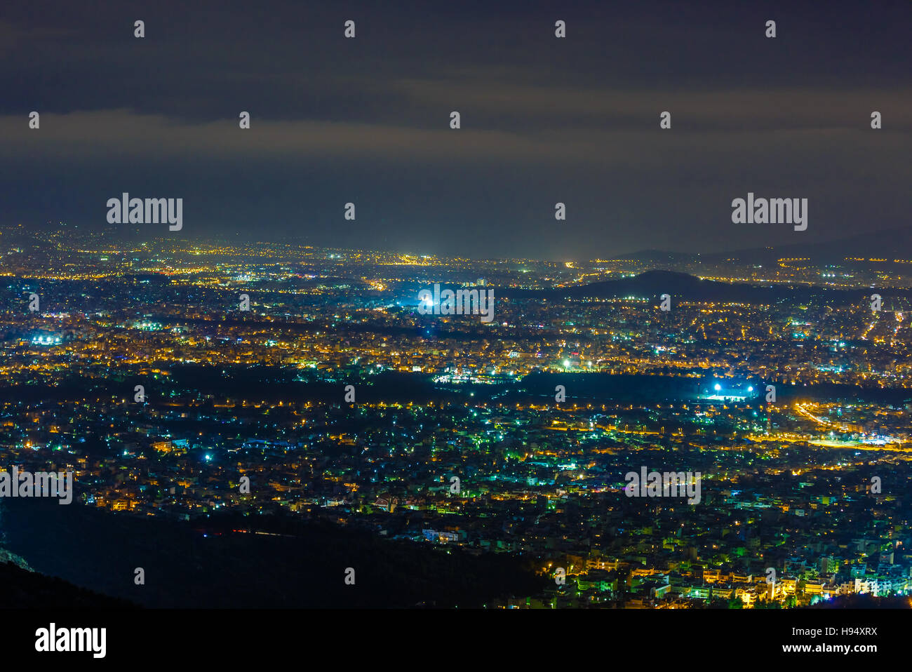 Athens skyline view after sunset with vivid street lights in Greece ...