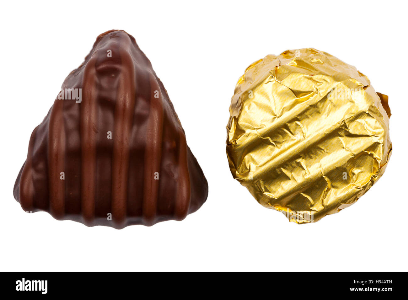 Two chocolate candies isolated on white background Stock Photo - Alamy
