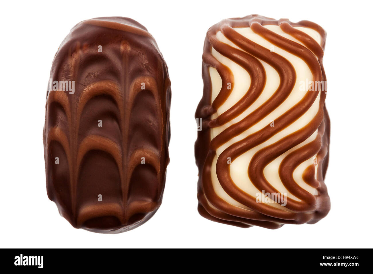 Two chocolate candies isolated on white background Stock Photo - Alamy