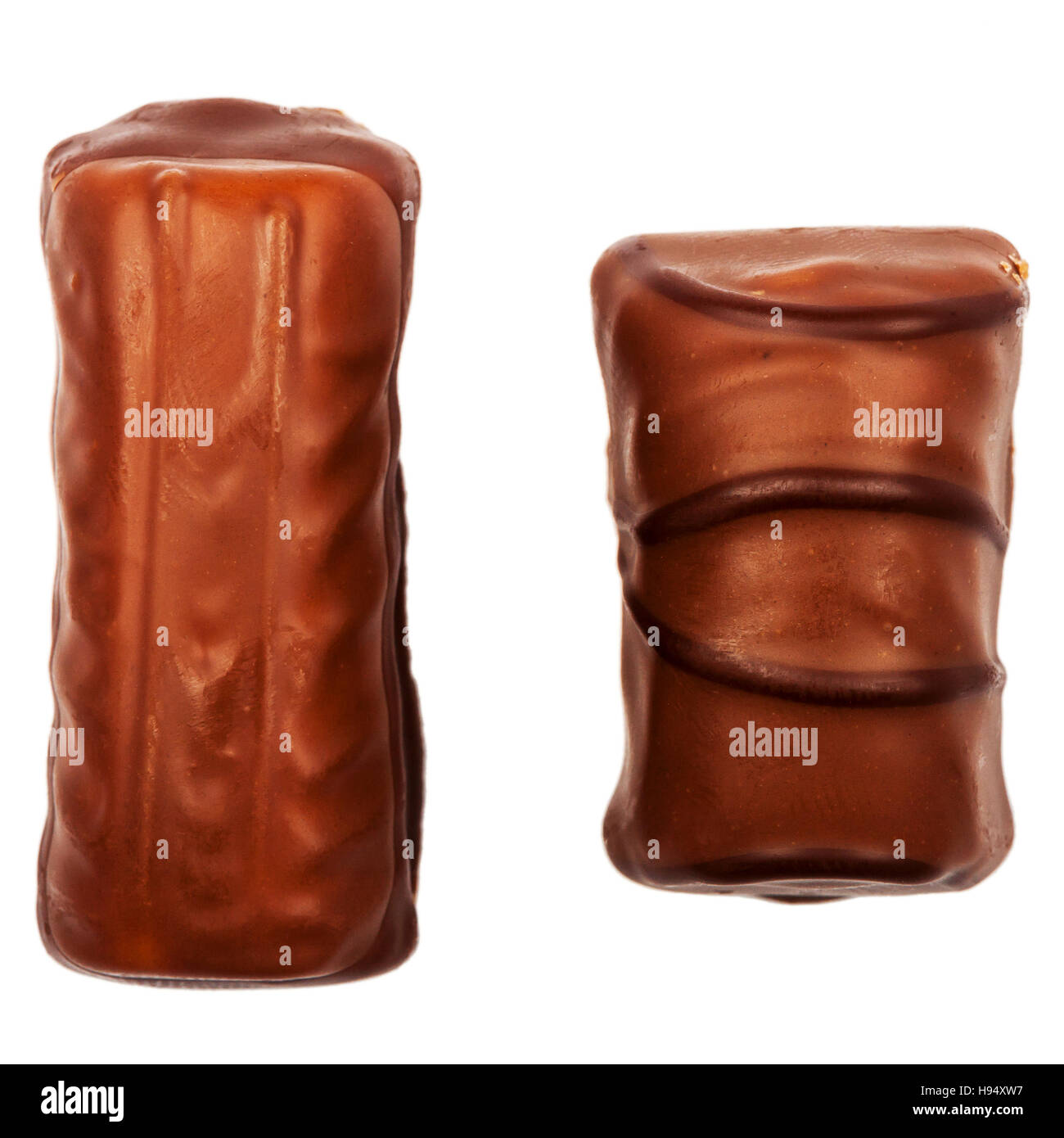 Two chocolate candies isolated on white background Stock Photo - Alamy