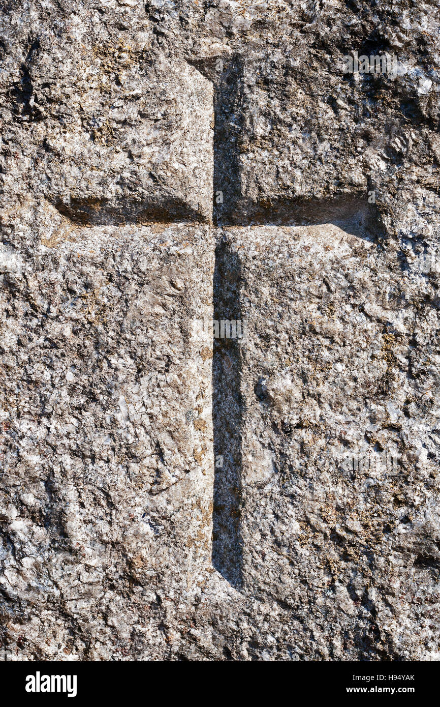 Cross symbol on a concrete texture Stock Photo - Alamy