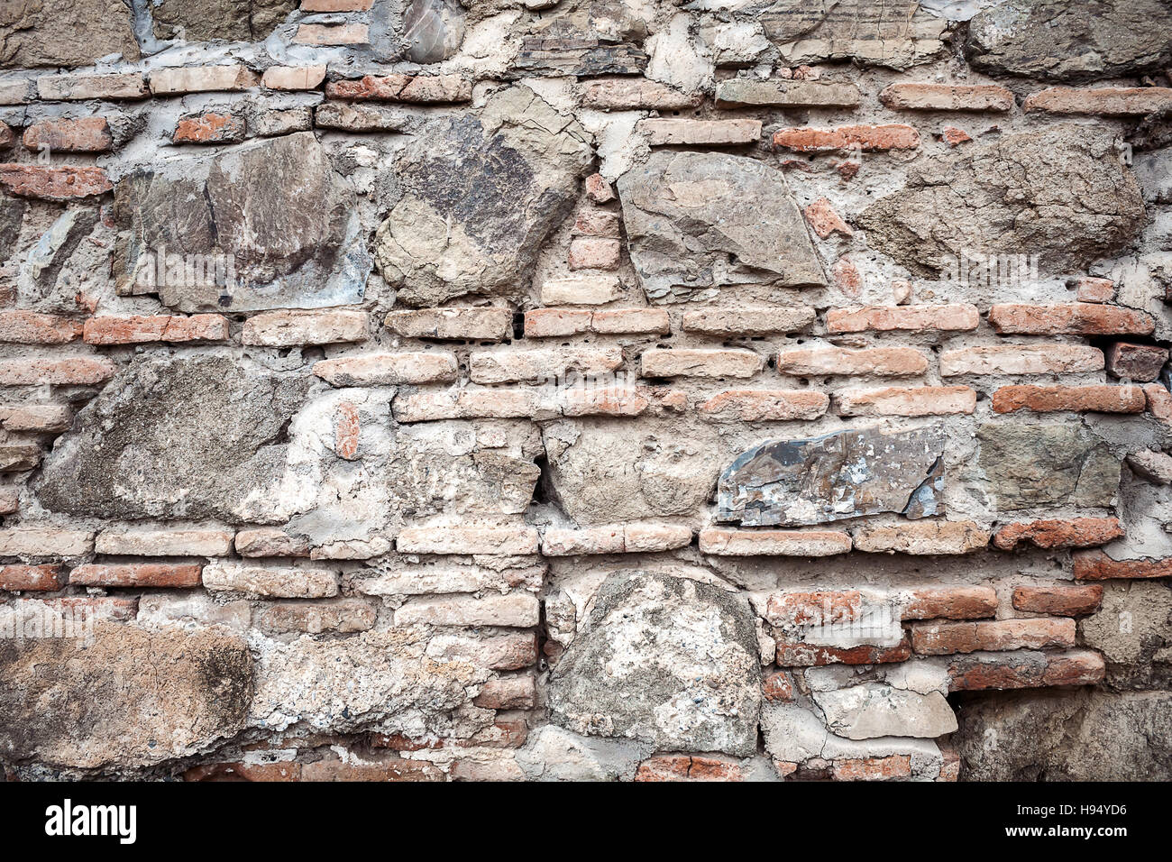 Pattern of old stone and brick wall Stock Photo - Alamy
