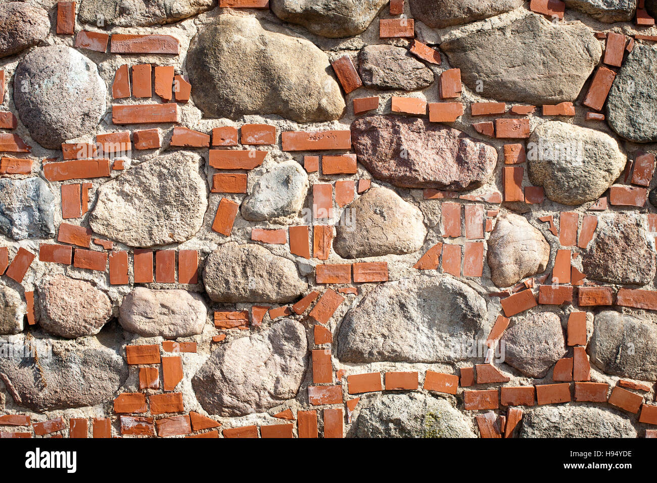 Pattern of old stone and brick wall Stock Photo - Alamy