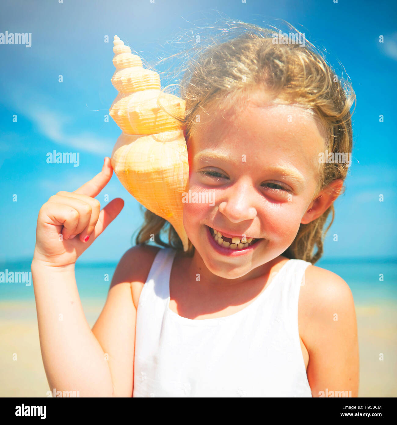 Girl Seashell Seashore Beach Summer Holiday Concept Stock Photo - Alamy