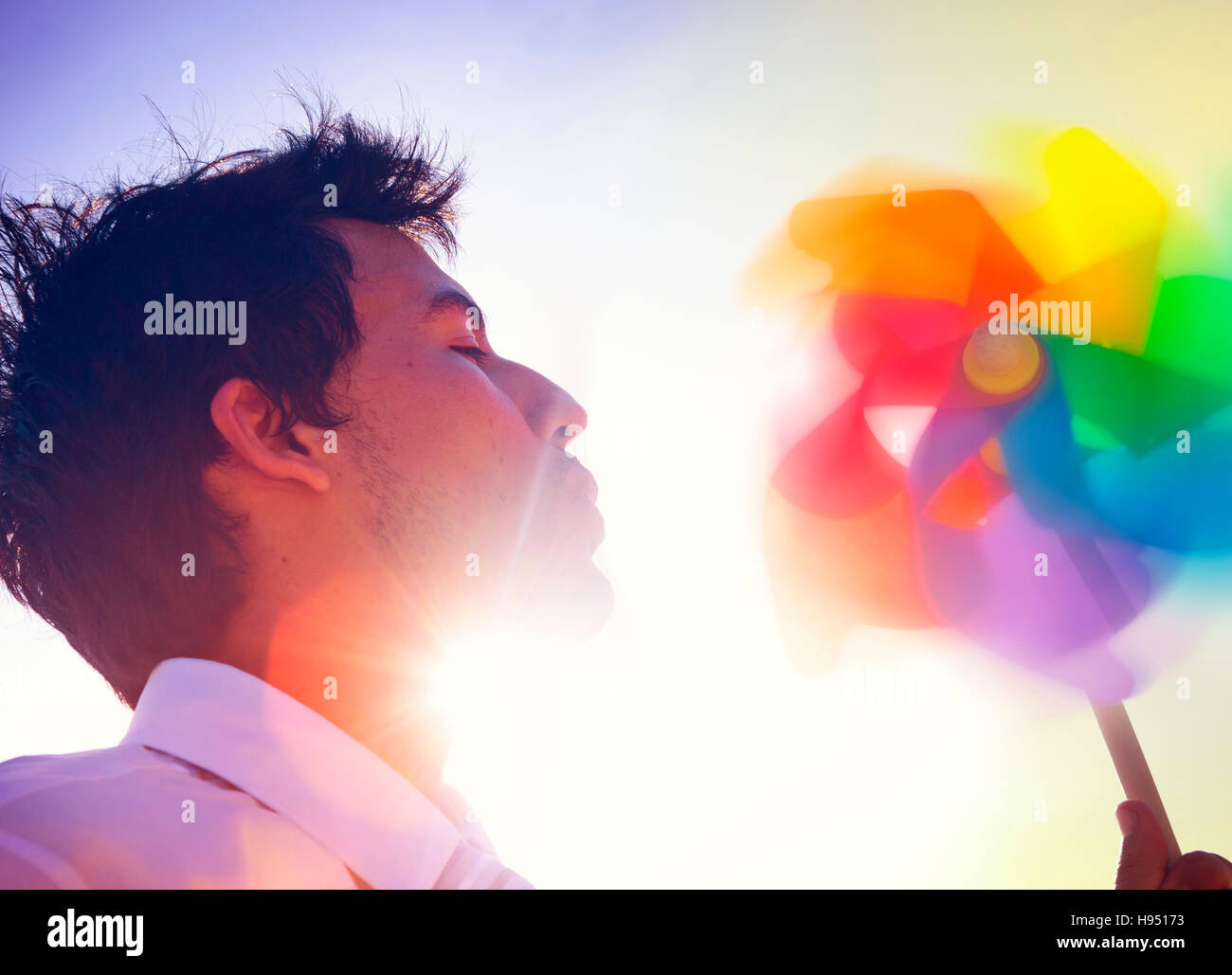 Businessman Blowing Wind Summer Power Energy Concept Stock Photo - Alamy