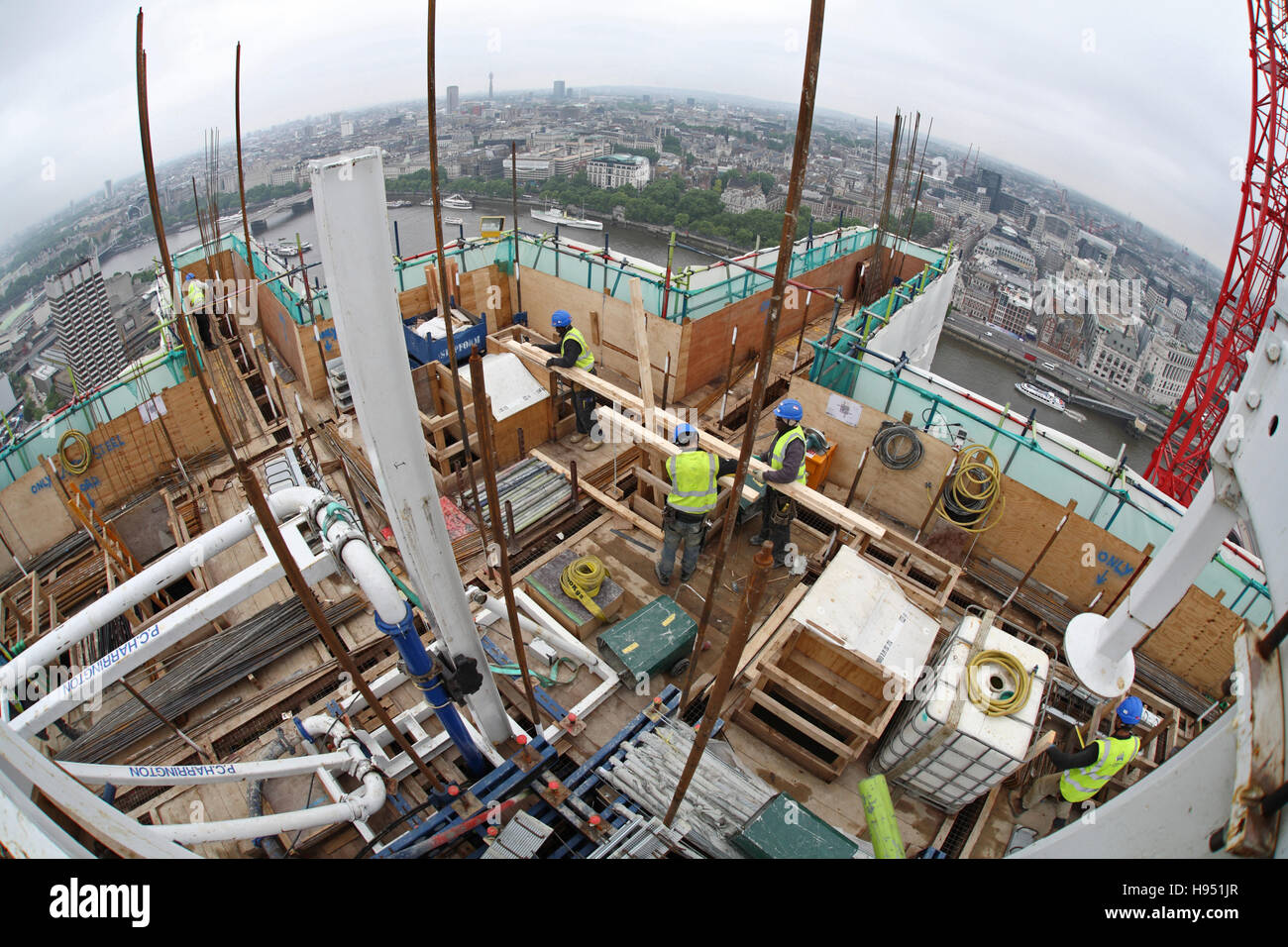 Construction of a new tower block on the south bank of the River Thames ...