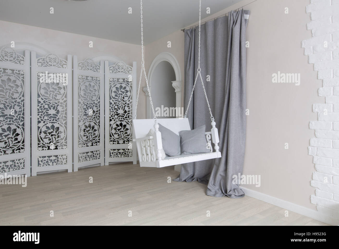 Modern gentle design of the room with a screen Stock Photo - Alamy