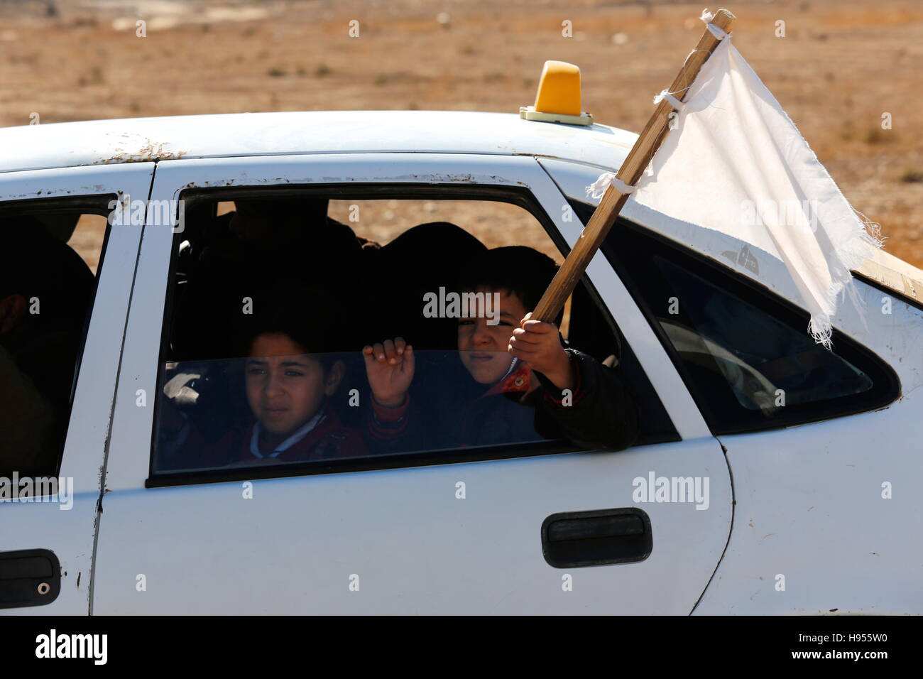 Mosul, Iraq. 3rd Nov, 2016. An Iraqi family waving white flag flee from ...