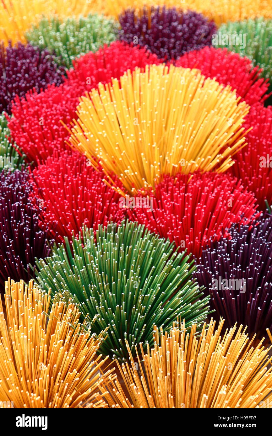 Colored incense sticks Stock Photo - Alamy