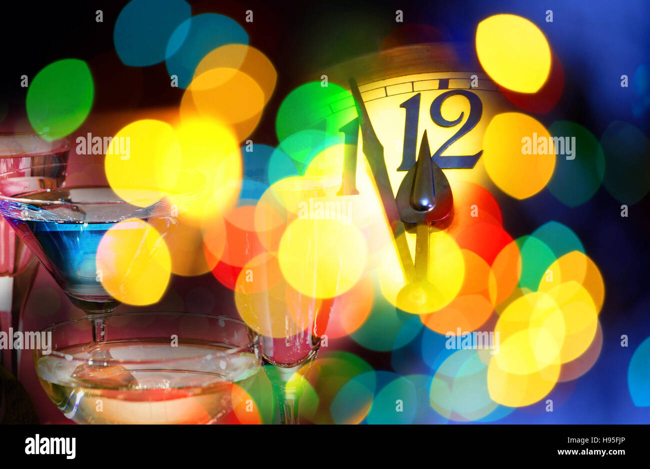face of new year clock with colored decoration Stock Photo - Alamy