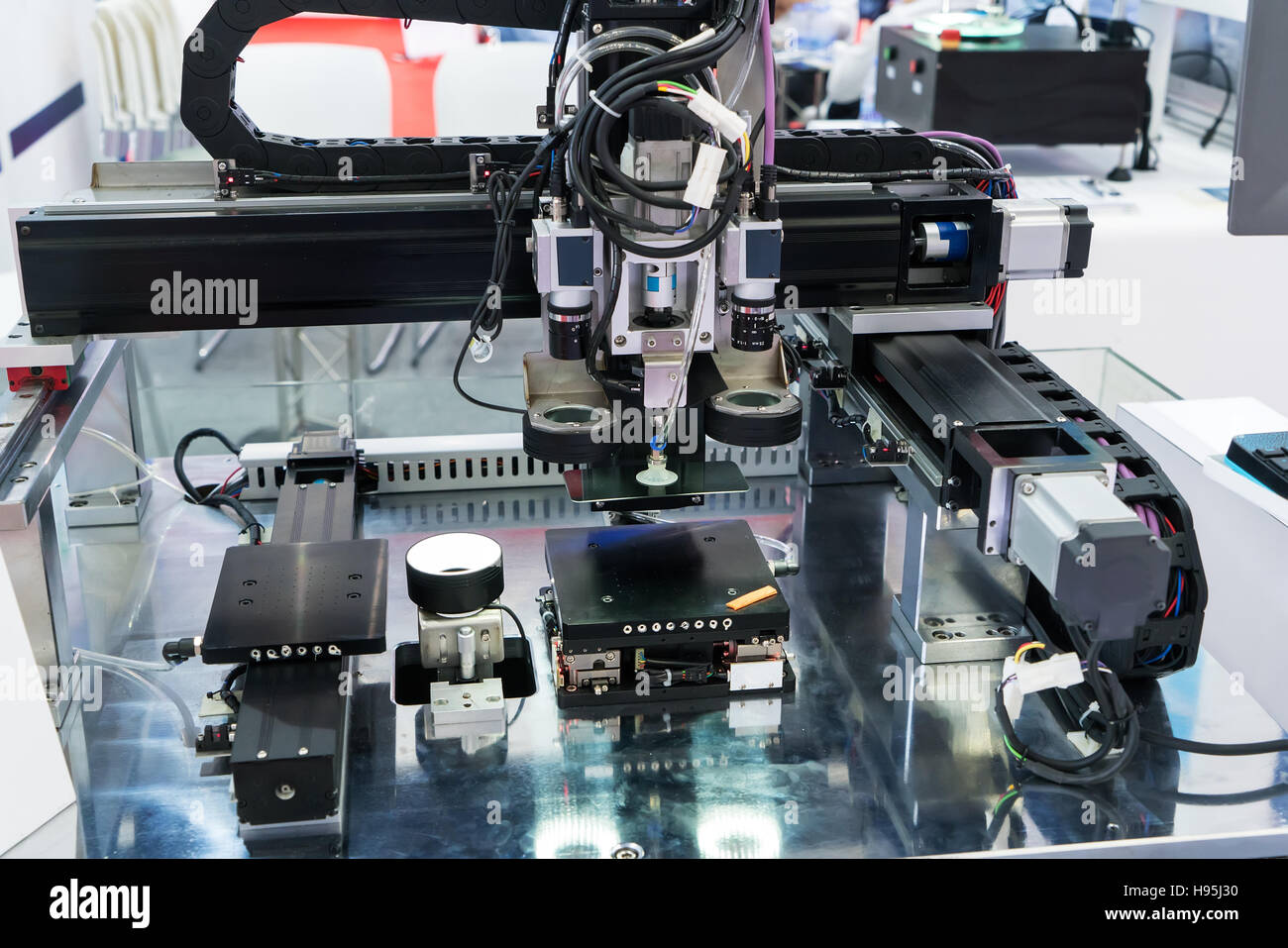 Robotic arm at production line in factory Stock Photo - Alamy