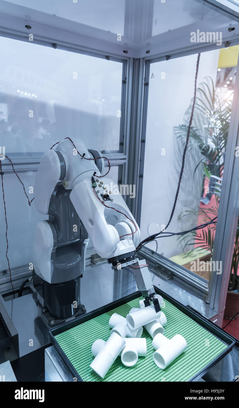 Robotic arm at production line in factory Stock Photo - Alamy