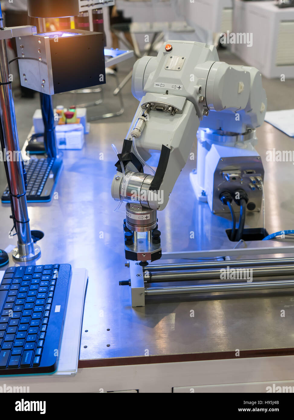 Robotic arm at production line in factory Stock Photo - Alamy