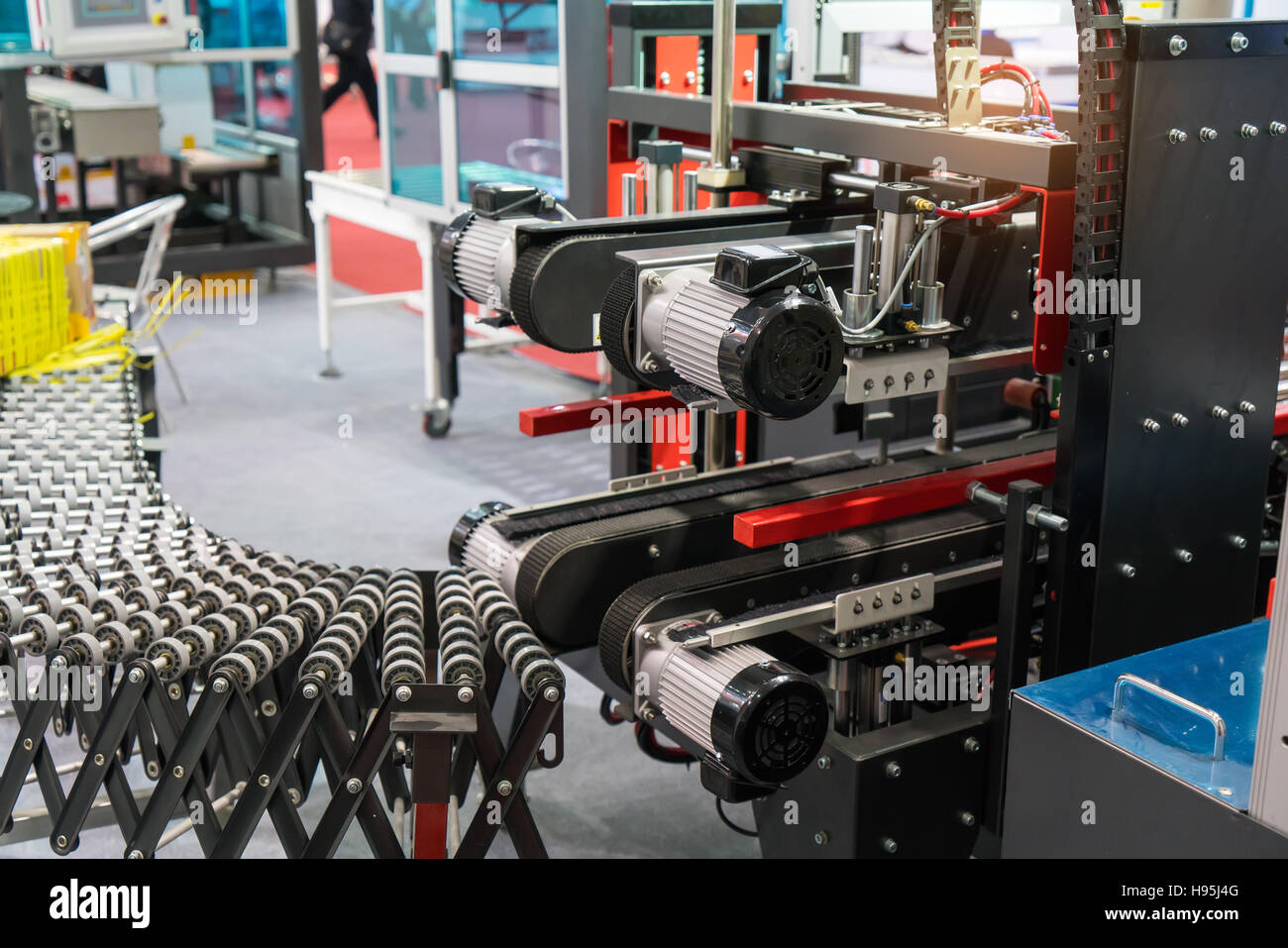 Robotic arm at production line in factory Stock Photo - Alamy
