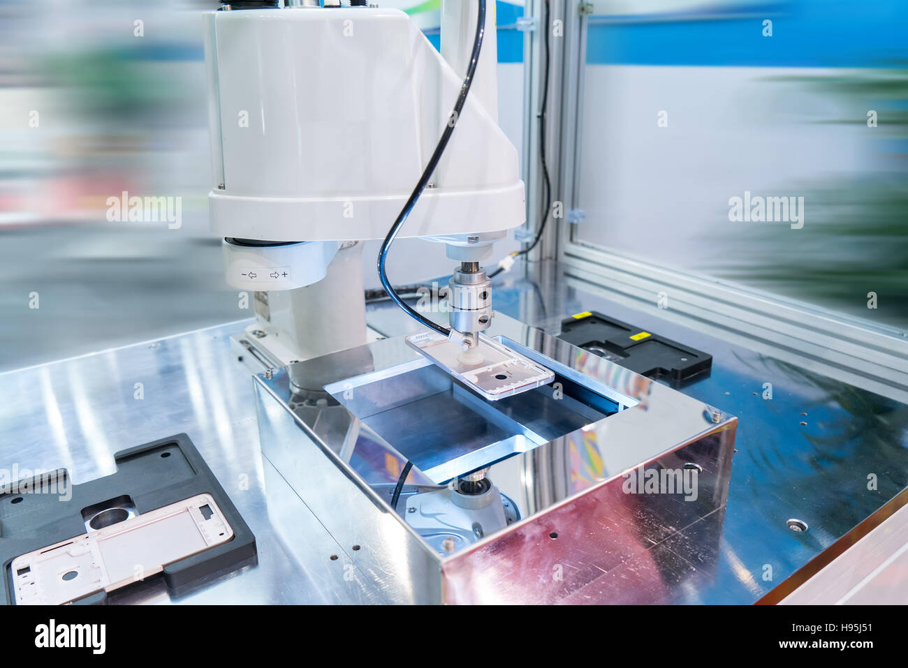Robotic arm at production line in factory Stock Photo - Alamy