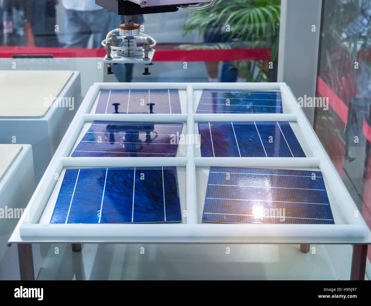 production of solar panels, Industrial robot working in factory ...