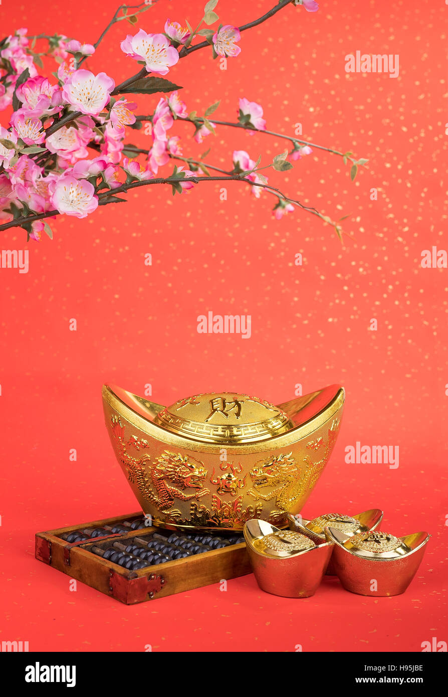 Chinese gold ingot and abacus mean symbols of wealth and prosperity ...