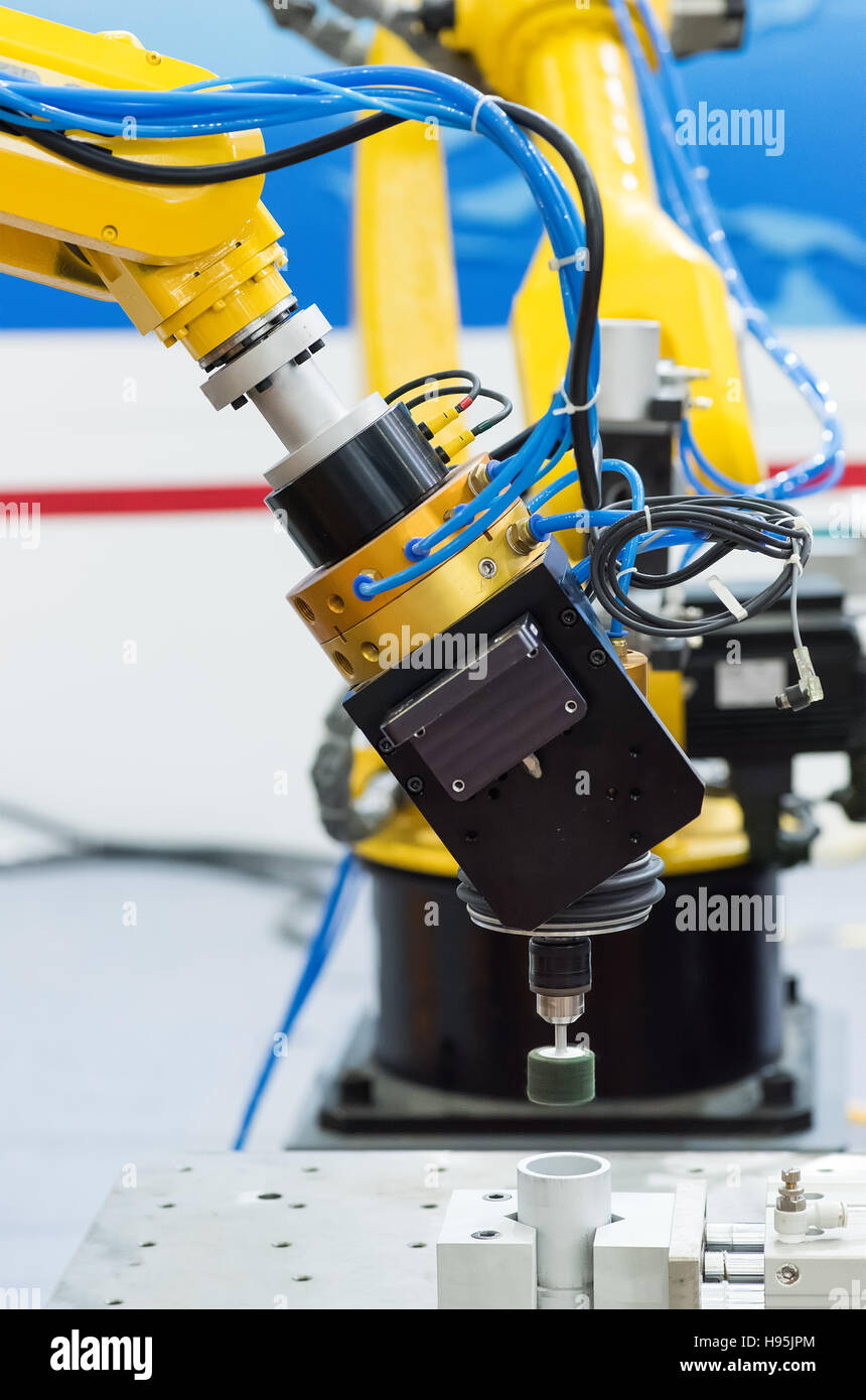 Robotic arm at production line Polished in factory Stock Photo - Alamy