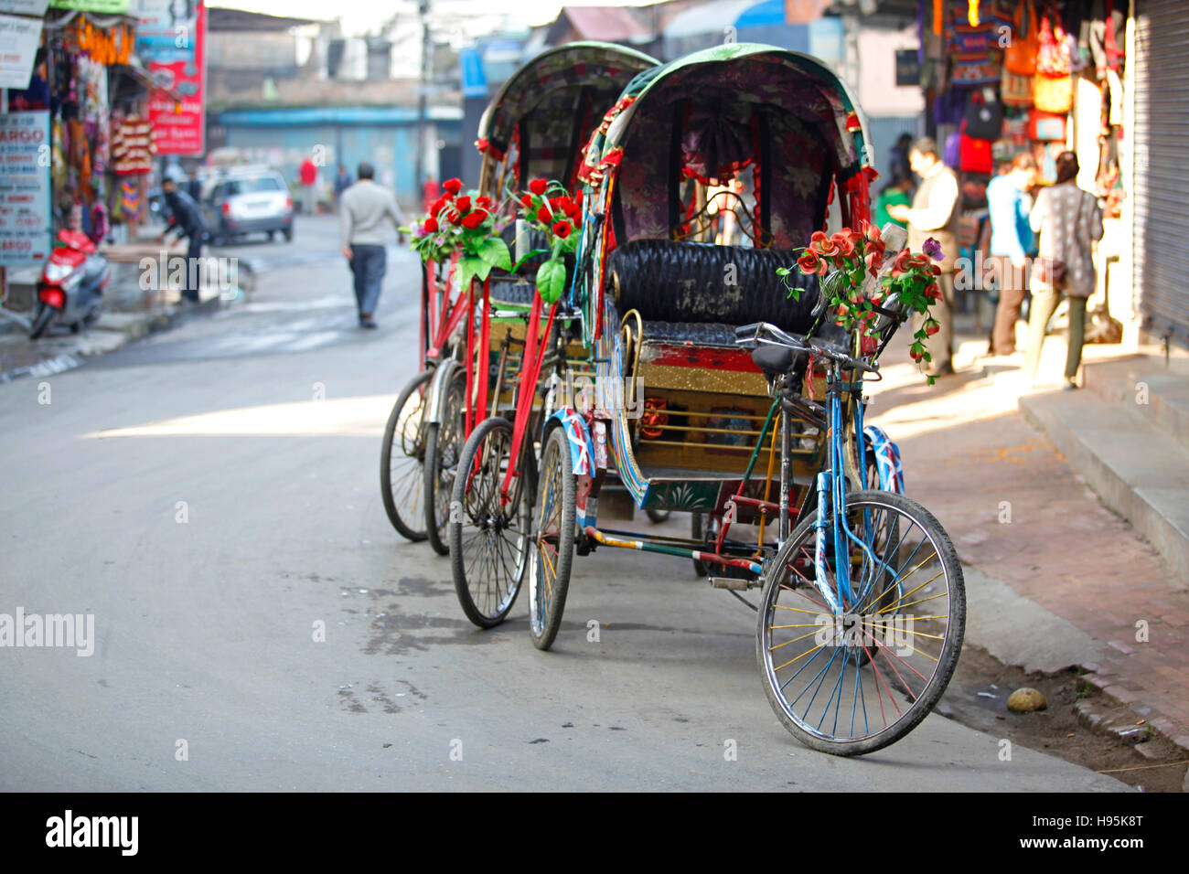 Cycle-rickshaws in a street of Kathmandu, Nepal Stock Photo - Alamy