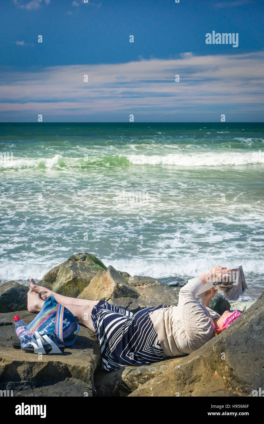 Reading the Papers Stock Photo - Alamy