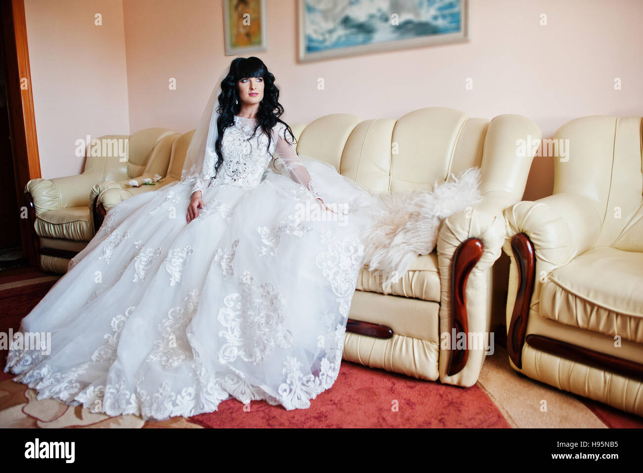 Bride sitting on couch hi-res stock photography and images - Alamy