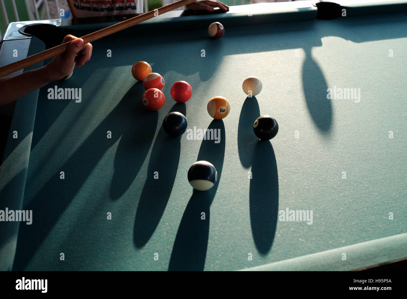 Shadows on a pool table Stock Photo - Alamy