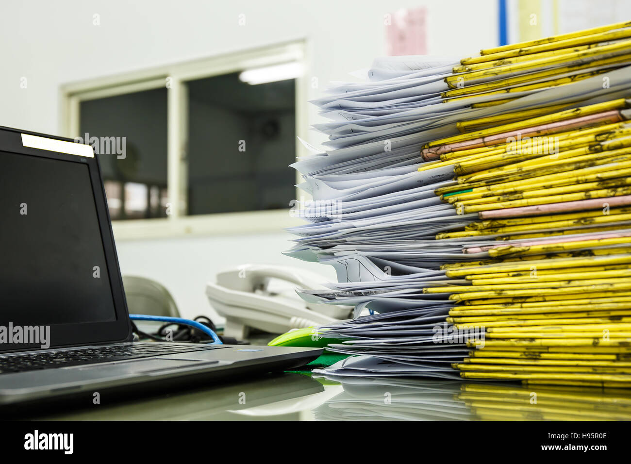 A pile of documents Desk Stock Photo - Alamy