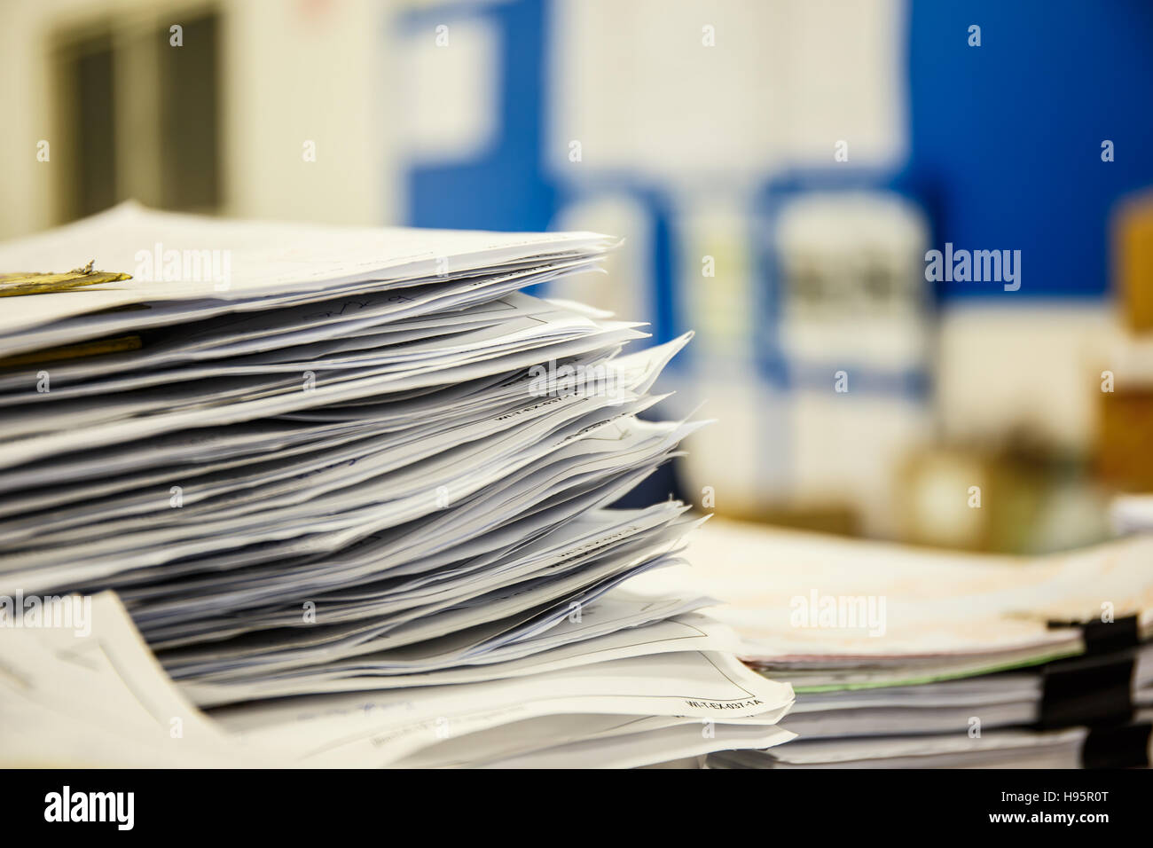 A pile of documents Desk Stock Photo - Alamy