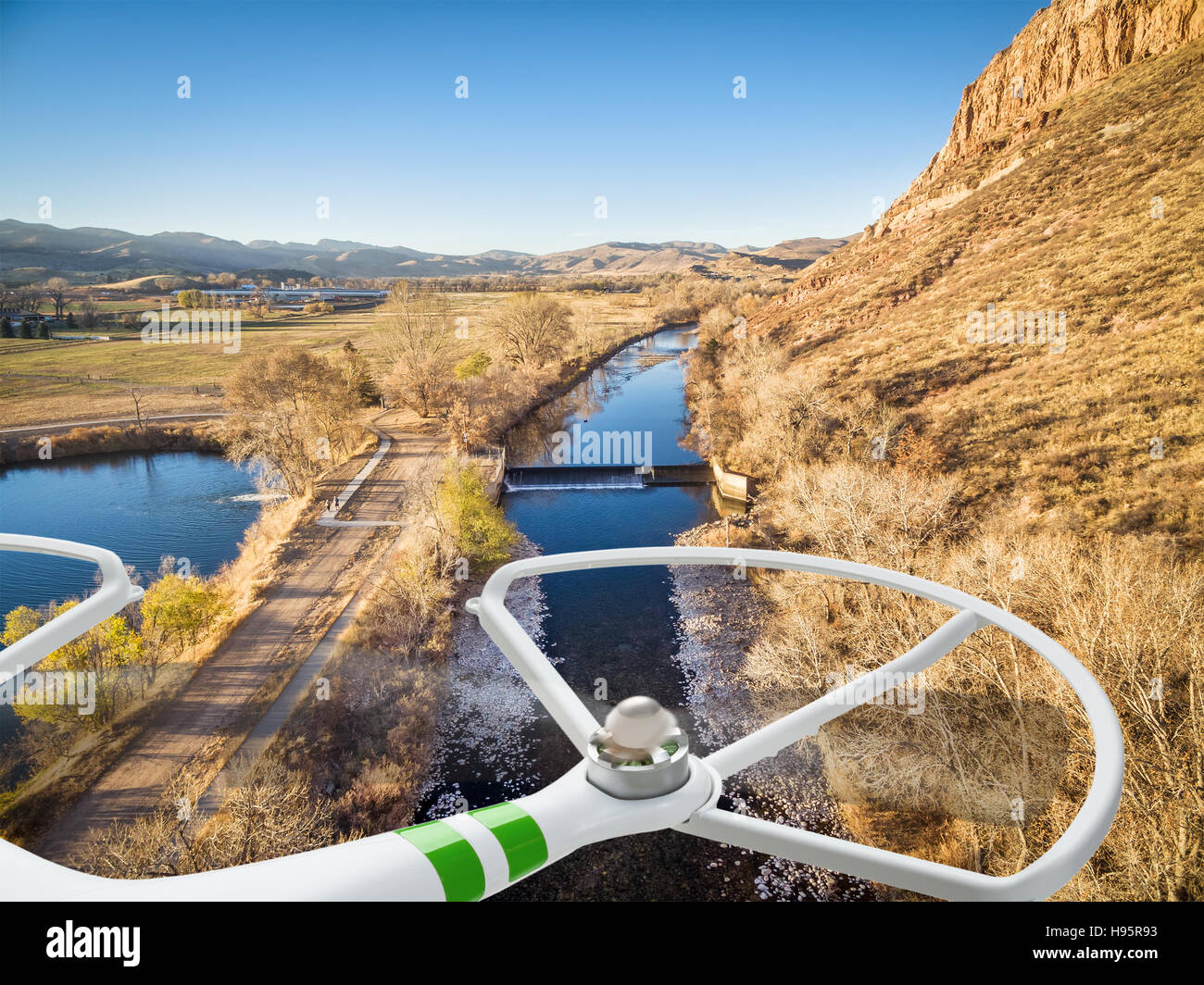 drone flying over rural Colorado - river, diversion dam, lake and ...