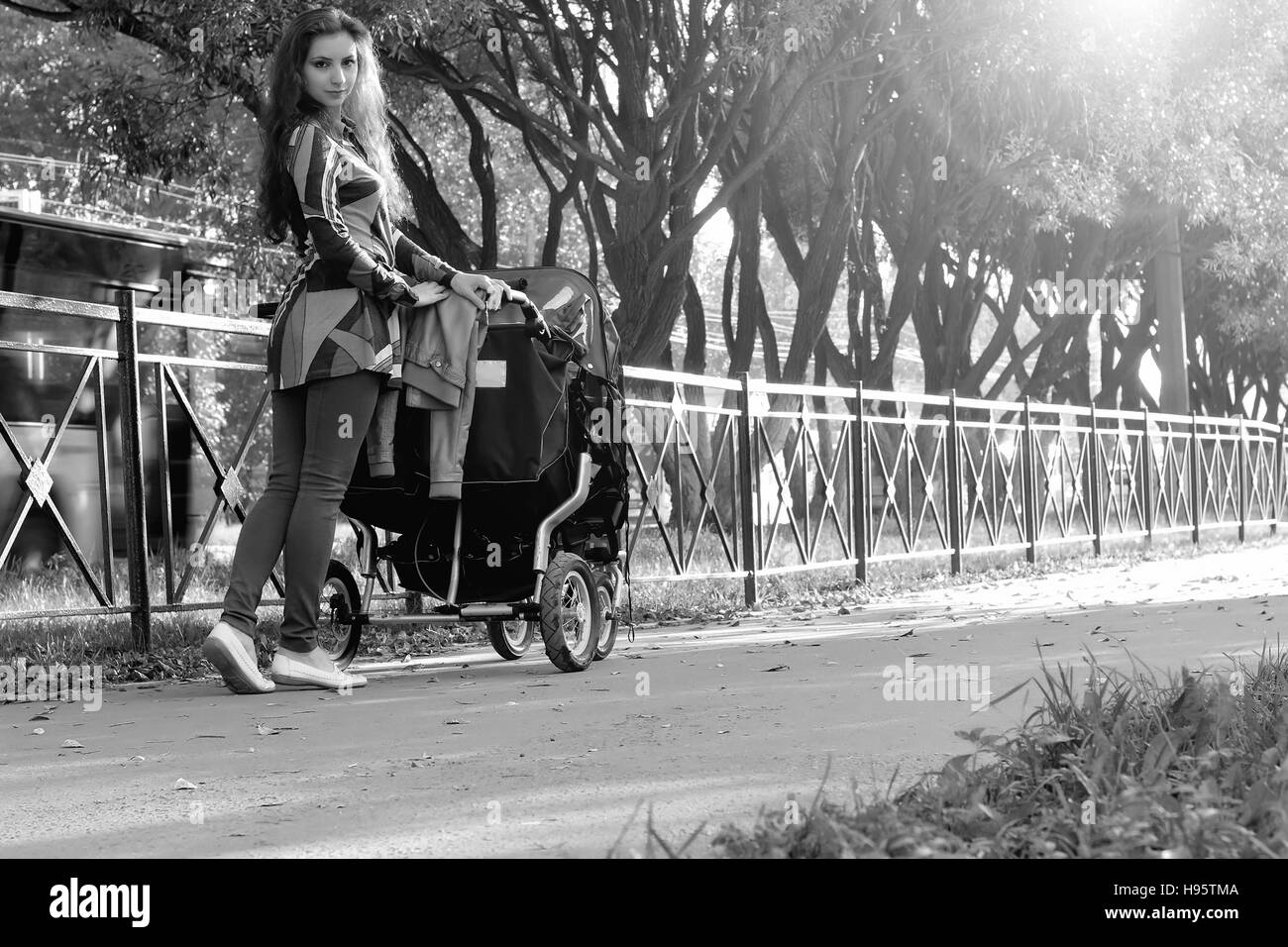 walk women with stroller Stock Photo - Alamy