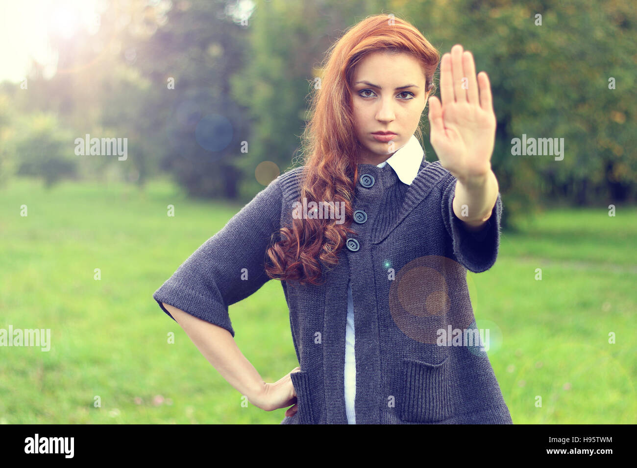 red-haired girl arm symbol Stock Photo - Alamy