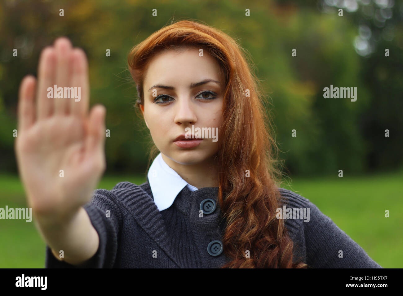 red-haired girl arm symbol Stock Photo - Alamy