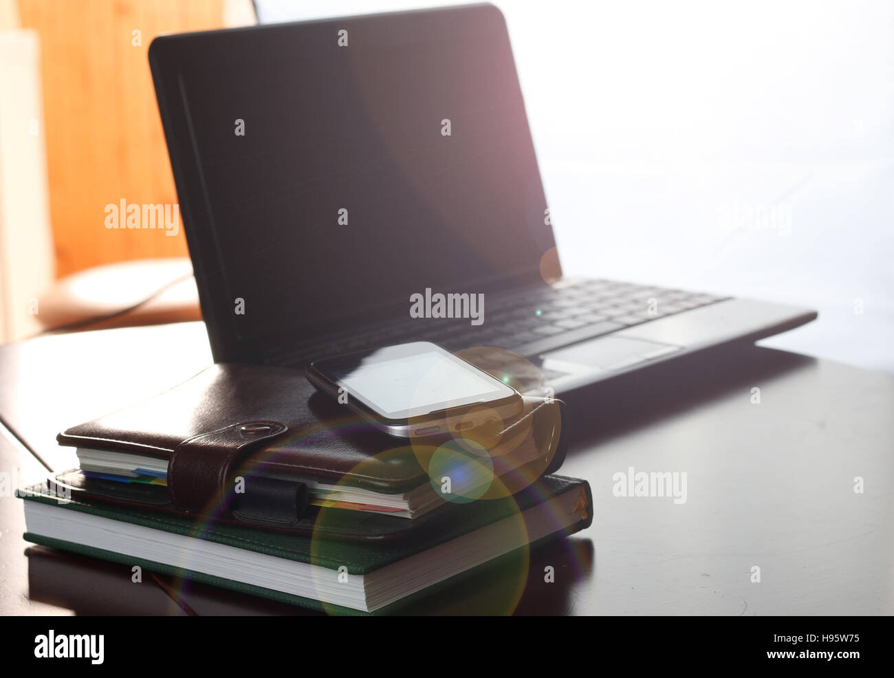 office desk with a computer and a telephone diary Stock Photo - Alamy