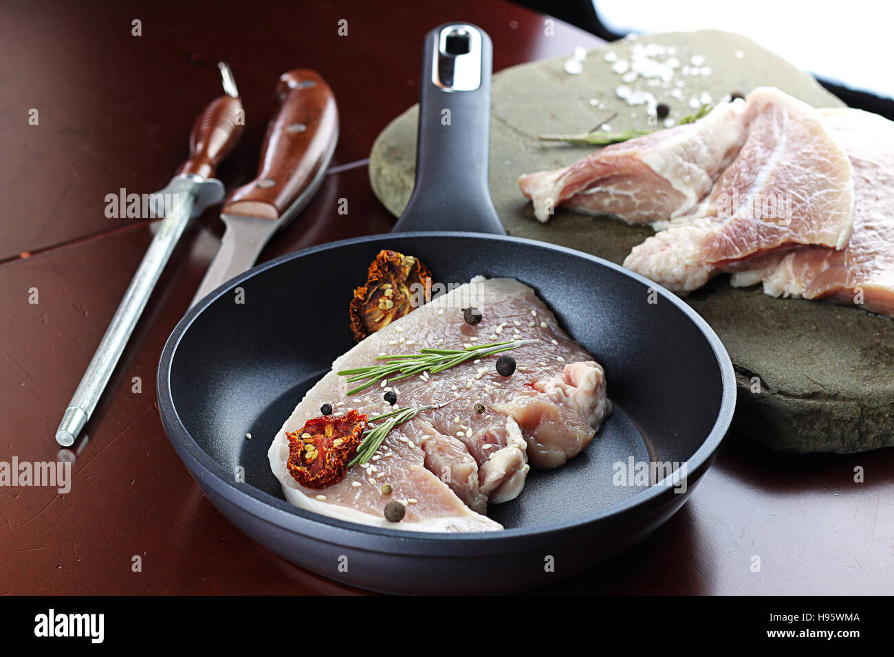 steak in a frying pan Stock Photo - Alamy